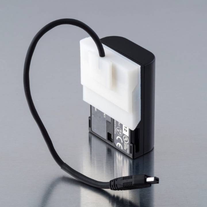 3D Printable External Camera Battery Adapter by Walter Hsiao