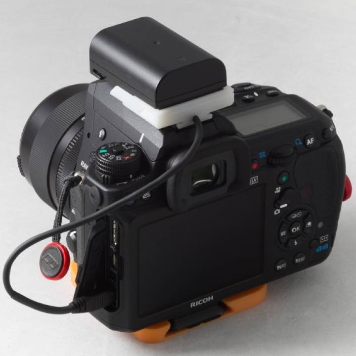 3D Printable External Camera Battery Adapter by Walter Hsiao
