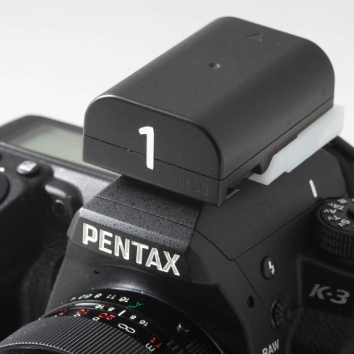 3D Printable External Camera Battery Adapter by Walter Hsiao