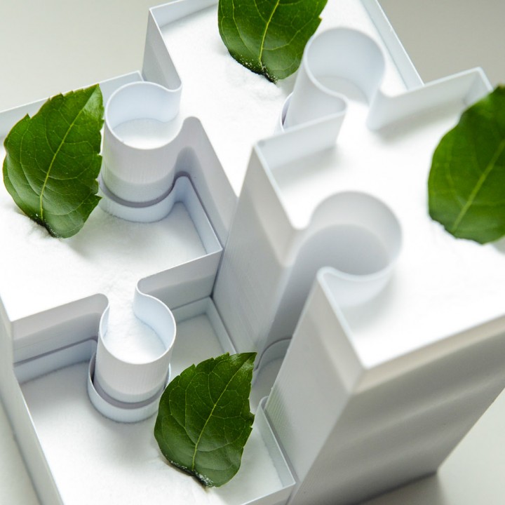 3D Printable Jigsaw Vase by Clockspring