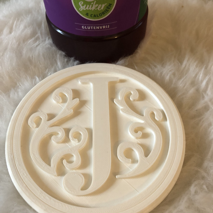 3D Printable Coaster letter 'J' by raimonvibe