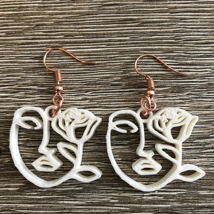 3D Printable Artistic face earring by raimonvibe