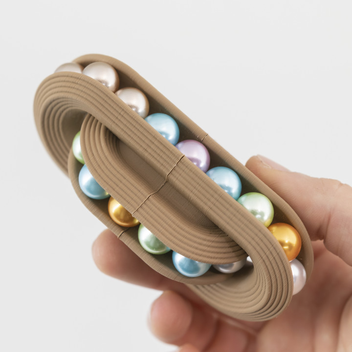 3D Printable the CHAIN puzzle // Retro by Devin Enrique Büchele de Montes