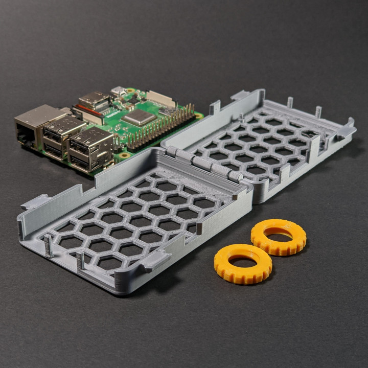 3D Printable Hinged Raspberry Pi case (3B+ etc) by Clockspring