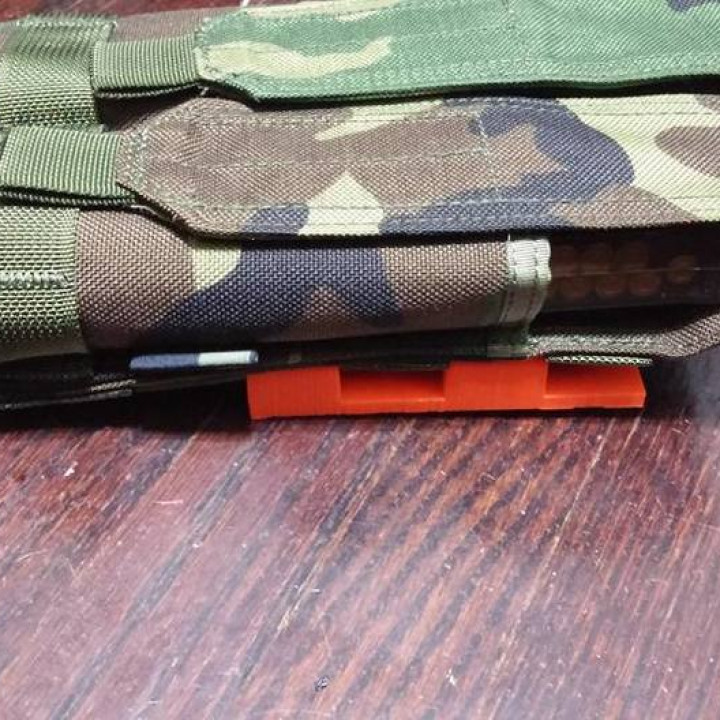 3D Printable Wall-Mounted MOLLE/PALS Mounting System (5 x 2) by Mike S
