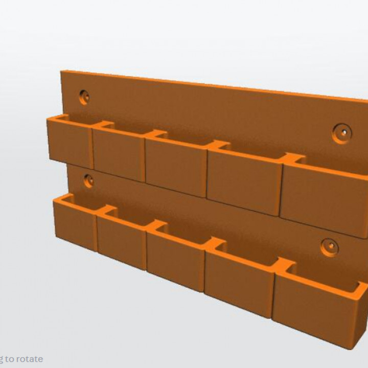 3D Printable Wall-Mounted MOLLE/PALS Mounting System (5 x 2) by Mike S