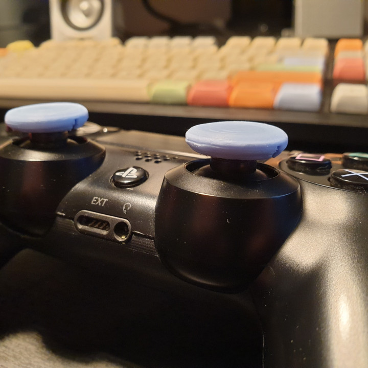 3D Printable Dualshock 4 Thumbstick Cover by Tane Lattanzio