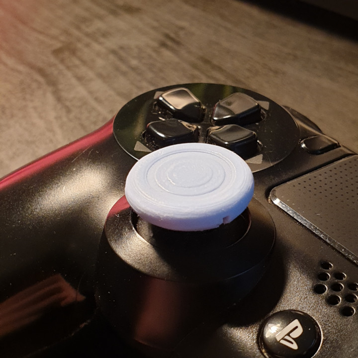 3D Printable Dualshock 4 Thumbstick Cover by Tane Lattanzio