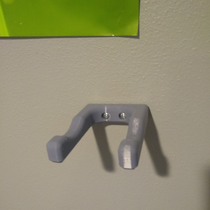 3D Printable Guitar Wall Mount Holder by Devan Metz