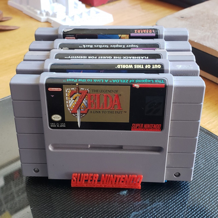 3D Printable Nintendo Nes , Snes & N64 Modular Cart Organizer by Max ...