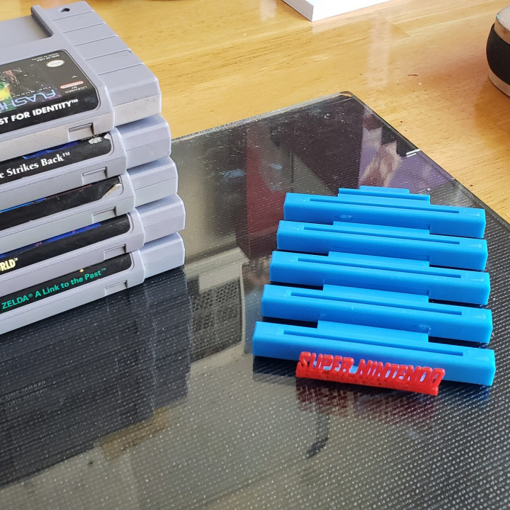 3D Printable Nintendo Nes , Snes & N64 Modular Cart Organizer by Max ...