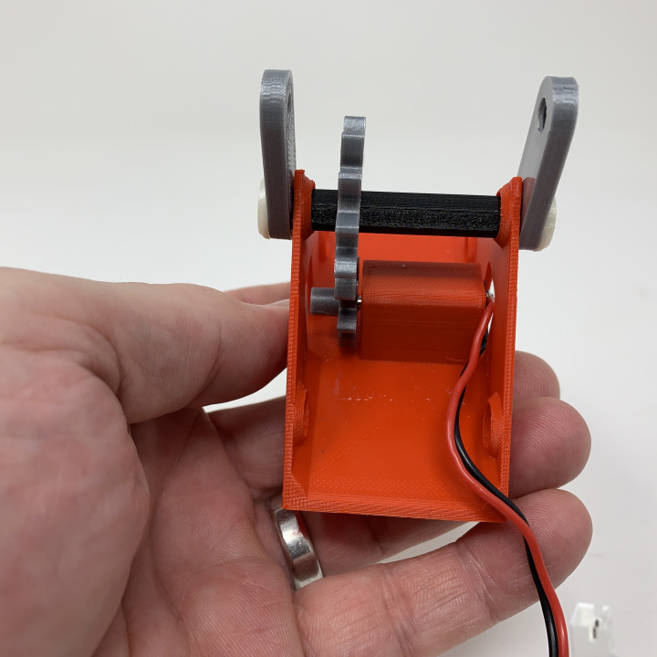 3D Printable A 3D Printed Simple "Walking" Mechanism. by Greg Zumwalt
