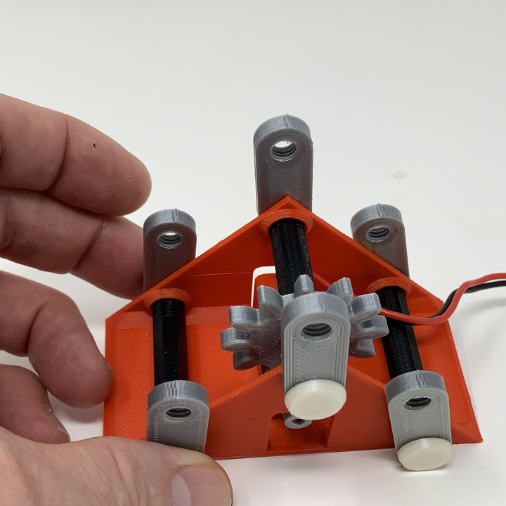 3D Printable A 3D Printed Simple "Walking" Mechanism. by Greg Zumwalt