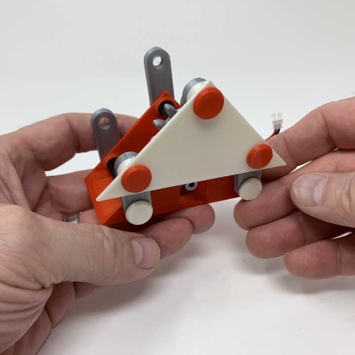 3D Printable A 3D Printed Simple "Walking" Mechanism. by Greg Zumwalt