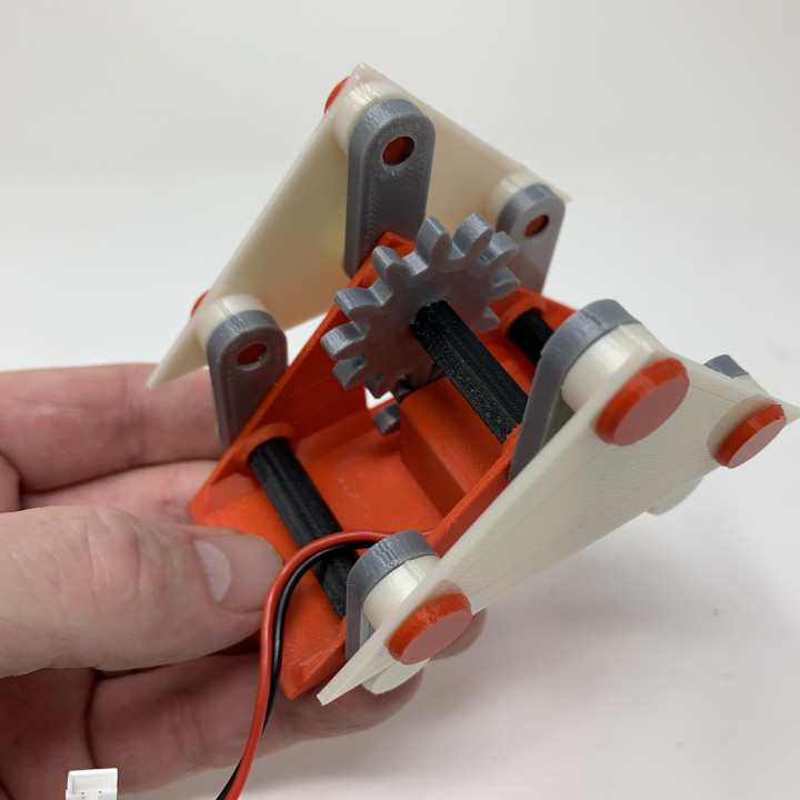 3D Printable A 3D Printed Simple "Walking" Mechanism. by Greg Zumwalt