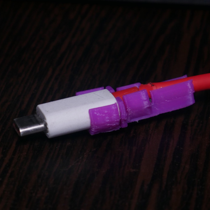 3D Printable USB stress relief cable retainer by Miras Derbissalin