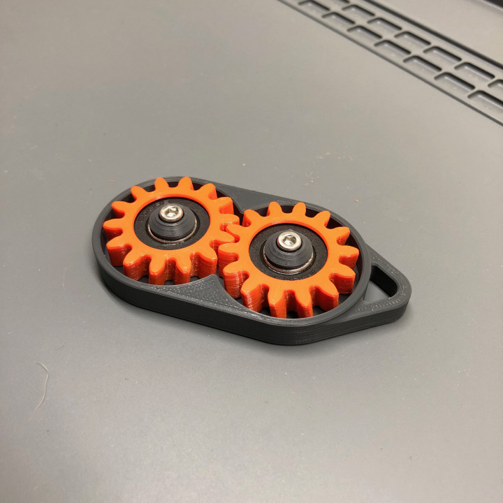 3D Printable Gear Spinner Keychain (No Heat Set Inserts) by Dave $auvageau