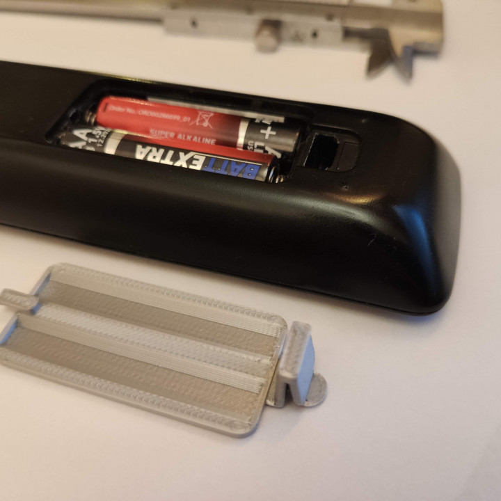 3D Printable Battery cover for remote for Arris VP1113 set top box by Aivar