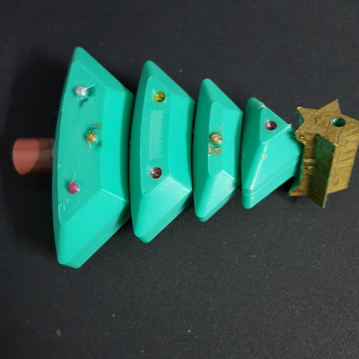 3D Printable Christmas tree spinning keychain and ornament (Articulated ...