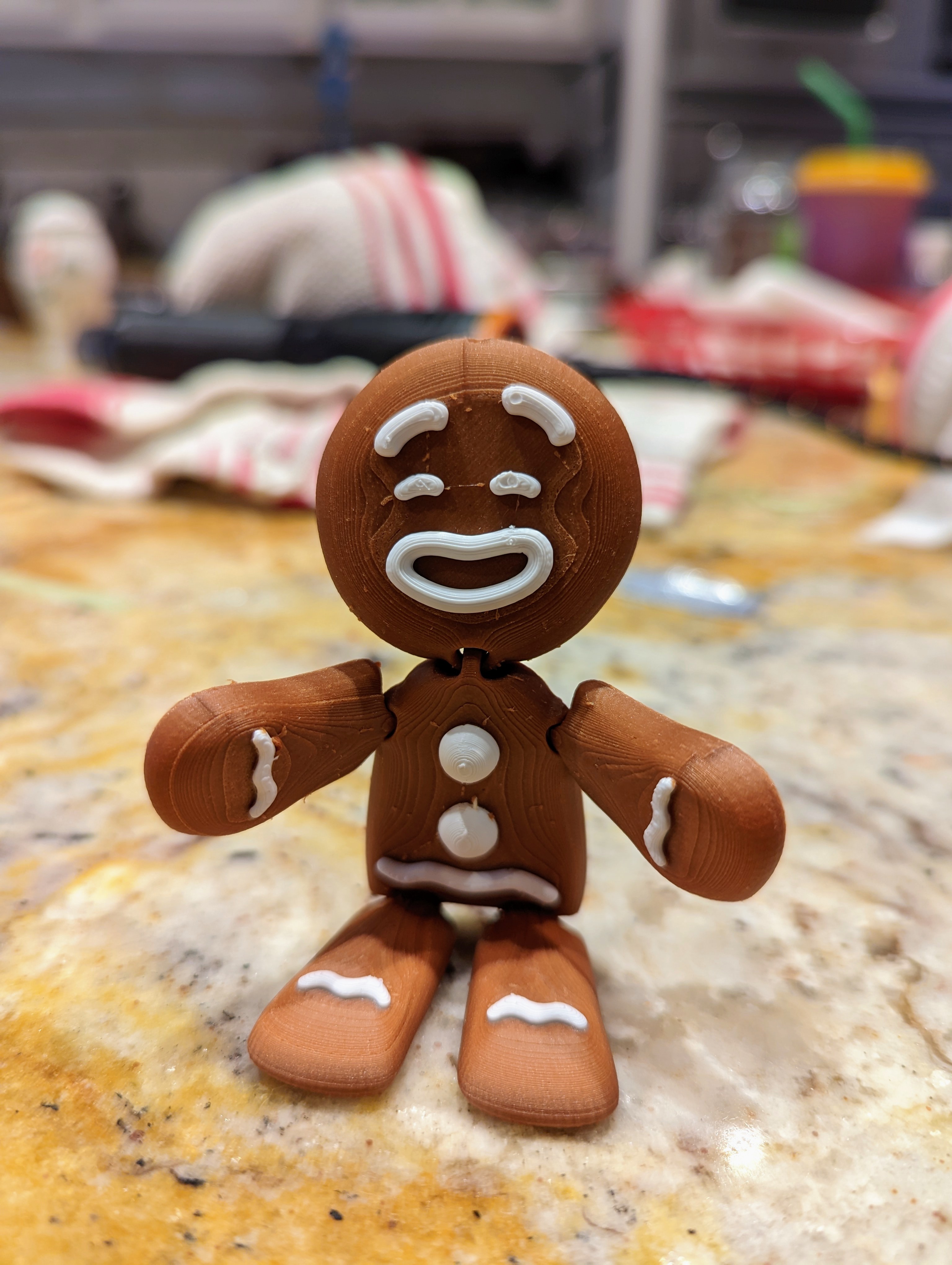 3D Printable Flexi Print-In-Place Gingerbread Man by Flexi Factory