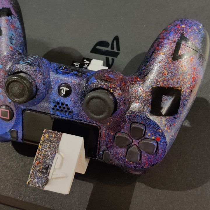3D Printable PS4 remote holder/wall mount by Shaurya Khosla