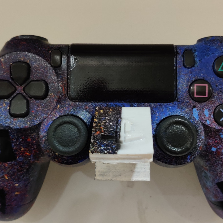 3D Printable PS4 remote holder/wall mount by Shaurya Khosla