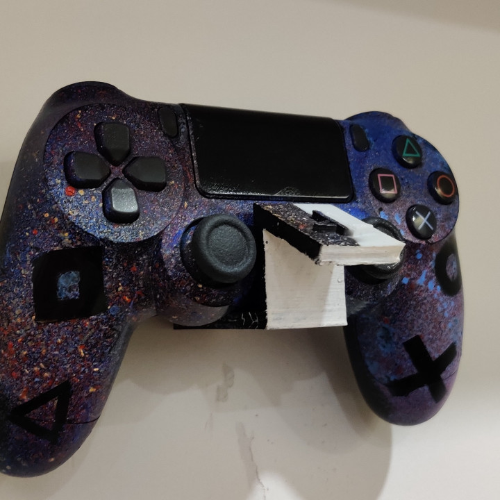 3D Printable PS4 remote holder/wall mount by Shaurya Khosla
