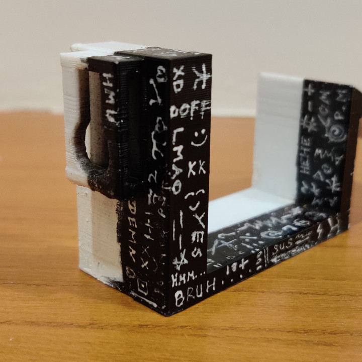 3D Printable PS4 remote holder/wall mount by Shaurya Khosla