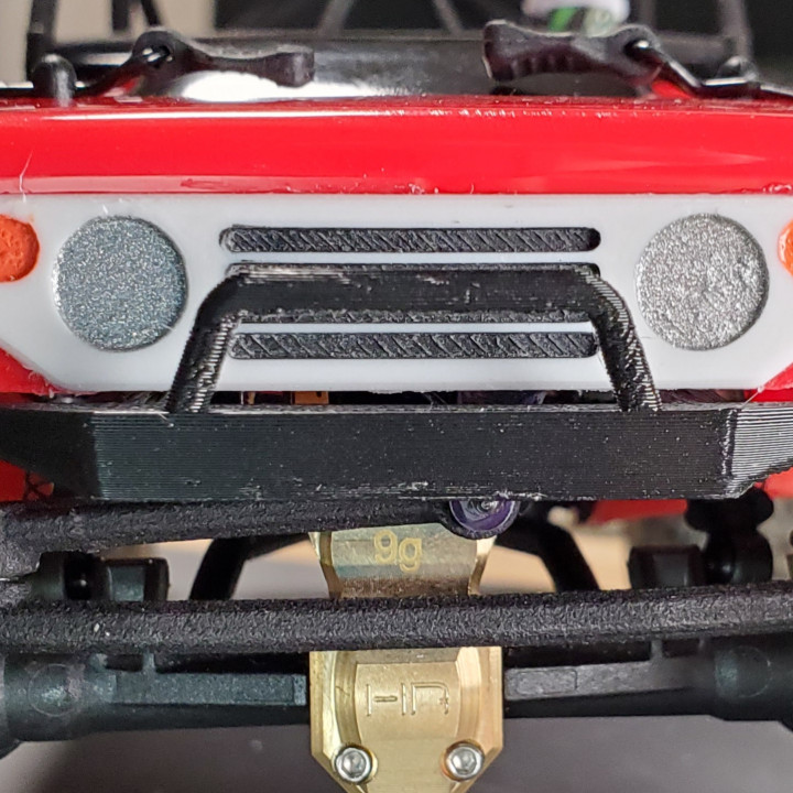 3D Printable SCX24 Bumper for TGH-24X Chassis by Derrick B. Williams