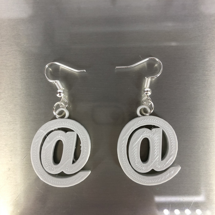 3D Printable At symbol earrings by Idea Lab