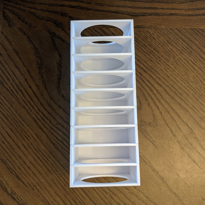 3D Printable Atari Cartridge Rack by Curtis
