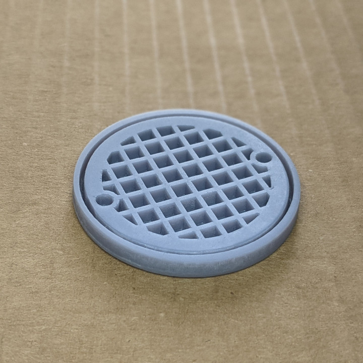 3D Printable Manhole Cover Bases by Dwayn Wyley