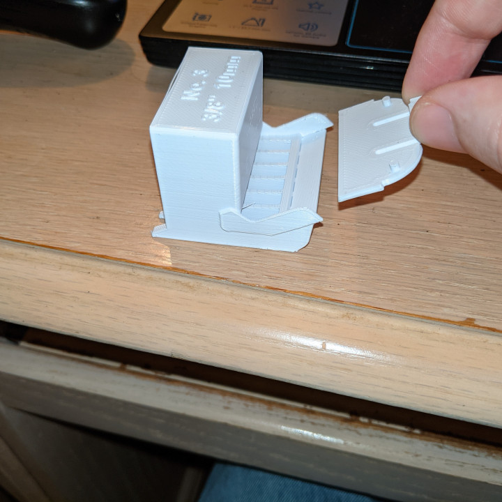 3D Printable Wahl Clipper Guard with Bin to Catch Clippings by Hapax