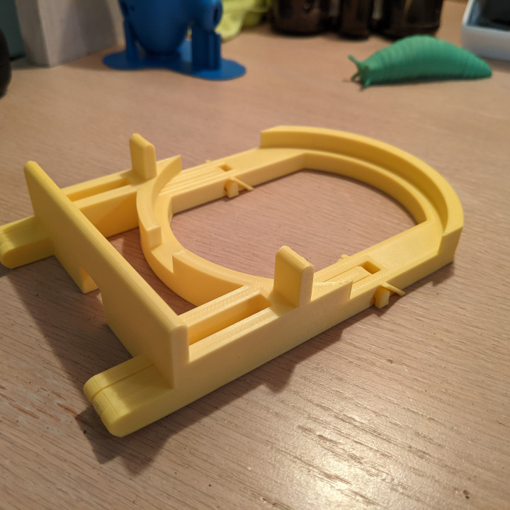 3D Printable Wireless Charger Phone Stand (Print in Place) by Hapax