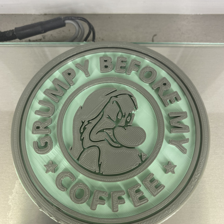 3D Printable 'Grumpy before my coffee' drinkcoaster by Idea Lab