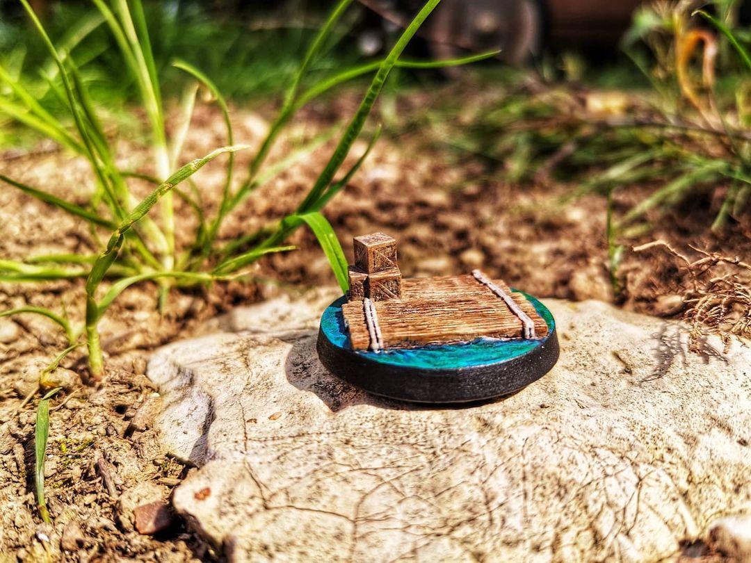 3D Printable Wooden Raft Base (32mm Round Swamp Base) by Admiral Apocalypse