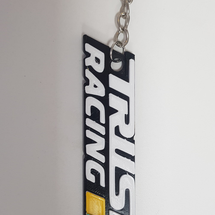 3D Printable Trust Racing Keychain by 3D Factory