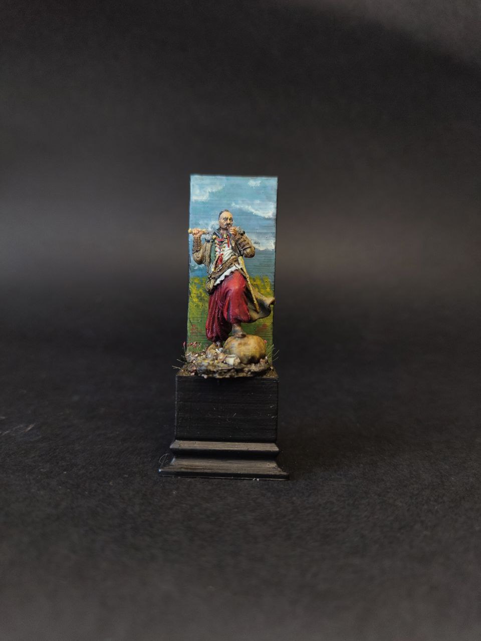 3D Printable Display plinths with backdrop by Ogareg Miniatures