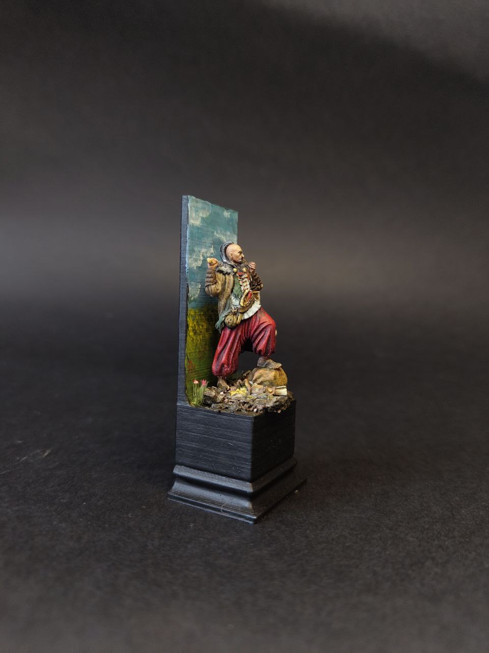 3D Printable Display plinths with backdrop by Ogareg Miniatures