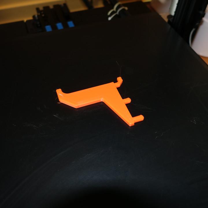 3D Printable Pegboard Tool Hanger by Dan Ouellet