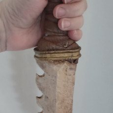3D Printable Dragon Tooth Dagger by Props&Beyond