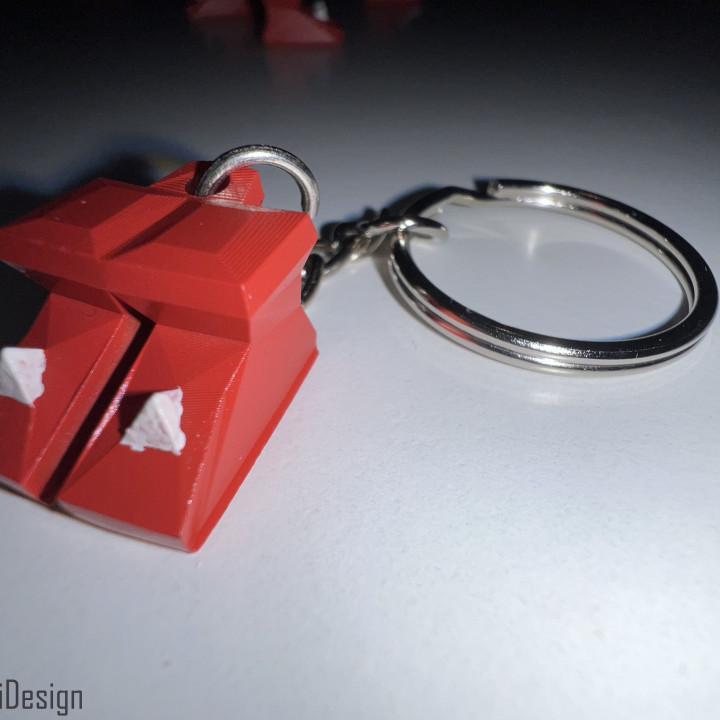 3D Printable Old School Runescape Dragon Boots Keychain by Luis Garcia