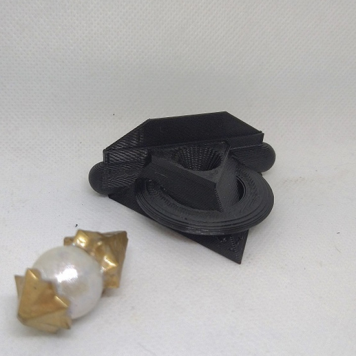 3D Printable Kyber Crystal Ring Stand with Card Slot by Tinkerers Cove