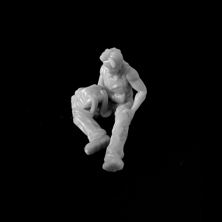 3D Printable Injured Man by Vaultz Miniatures