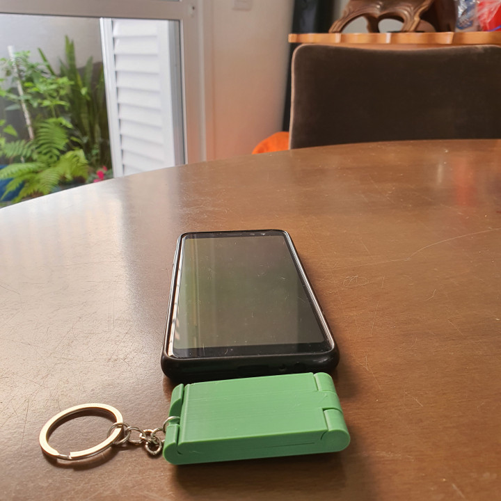 3D Printable Phone Holder Universal Key Ring by Eduardo Germani Martins