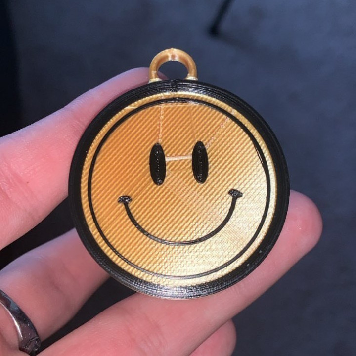 3D Printable Smiley Keychain by Aden p.