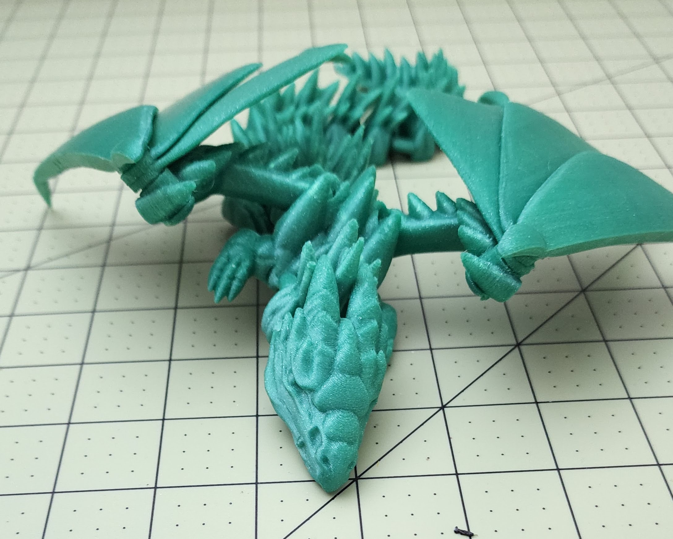 3D Printable Silver Dragon by The Dragon's Den