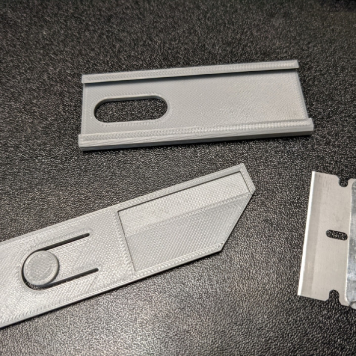 3D Printable Retractable Single-Edge Razor Box-Cutter by Josh