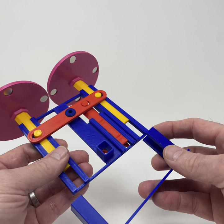 3D Printable A 3D Printed Slinky Machine by Greg Zumwalt