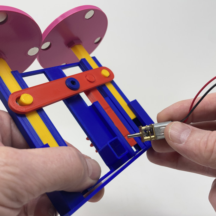 3D Printable A 3D Printed Slinky Machine by Greg Zumwalt